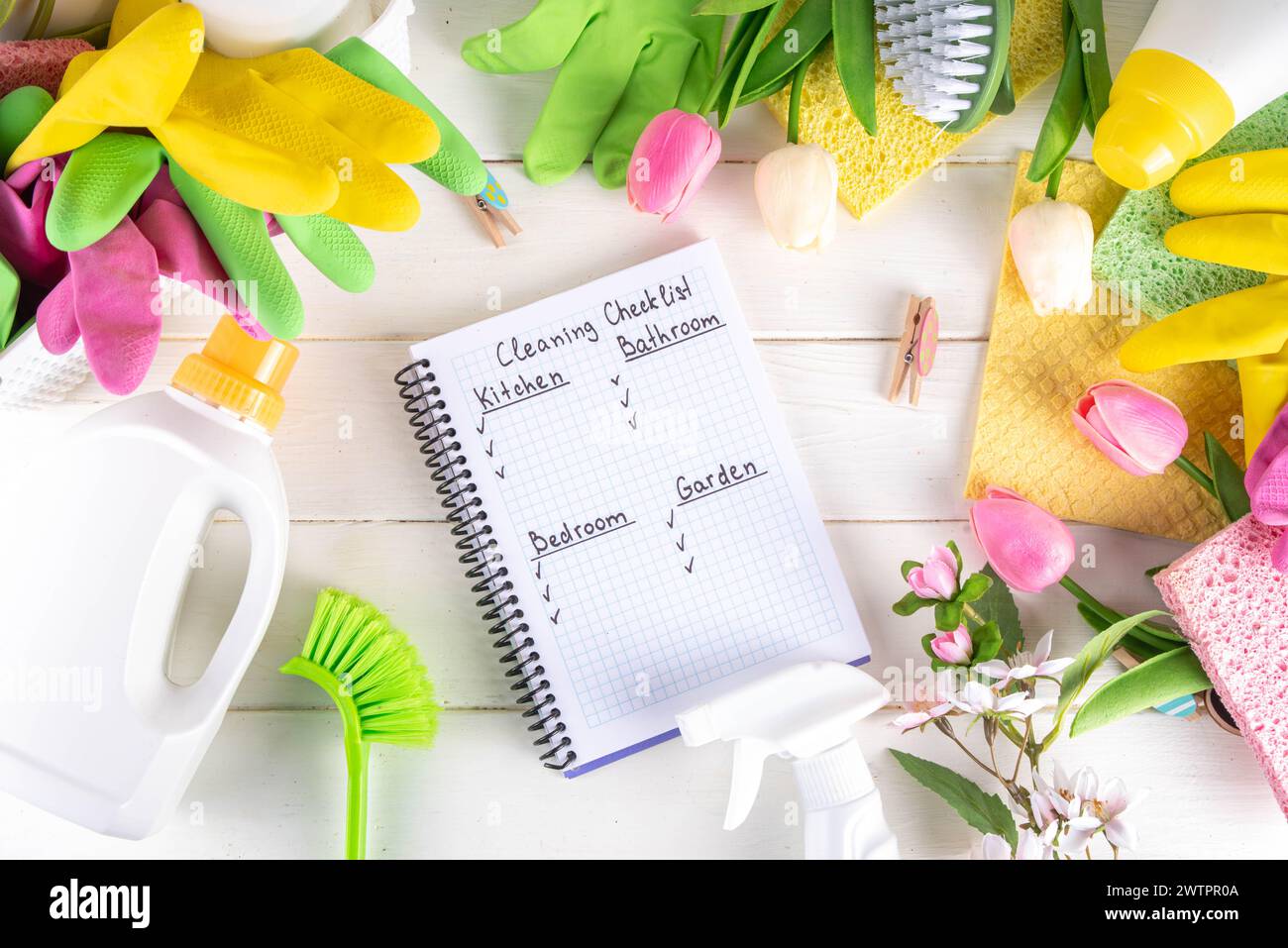 Spring cleaning background. Set of cleaning supplies, bottles ...