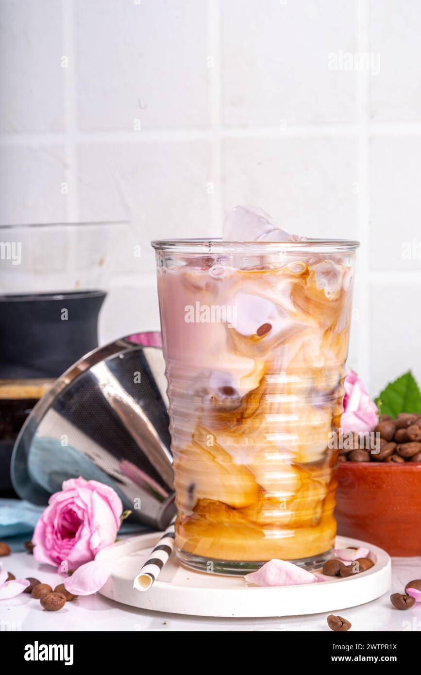 Iced Rose flower latte coffee drink, with pink rose petals taste almond ...