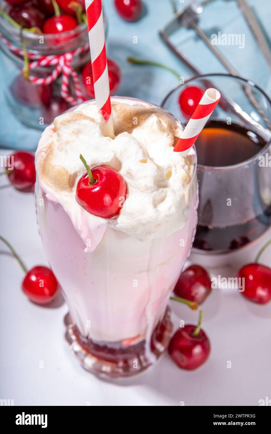 Sweet homemade cherry-cola milkshake with whipped cream, ice cream ...