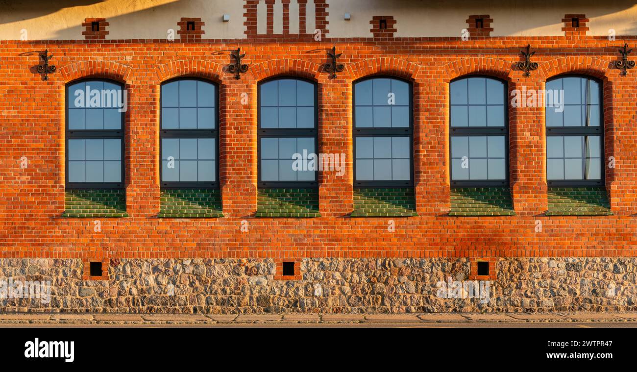 Facade of historic port warehouse building undergoing renovation Stock ...