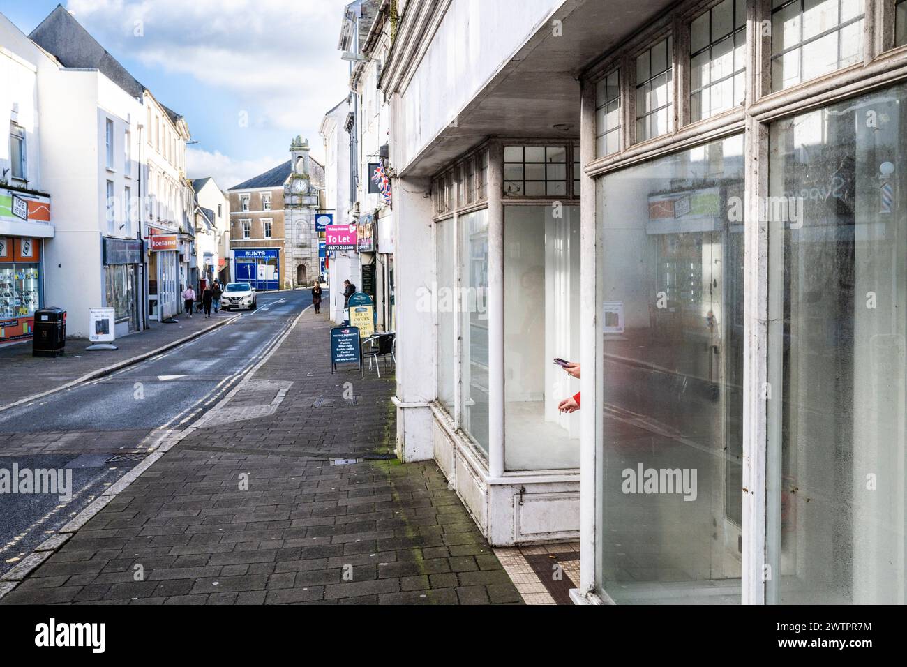 Shops Stores in Fore street in Bodmin Town centre in Cornwall n the UK ...