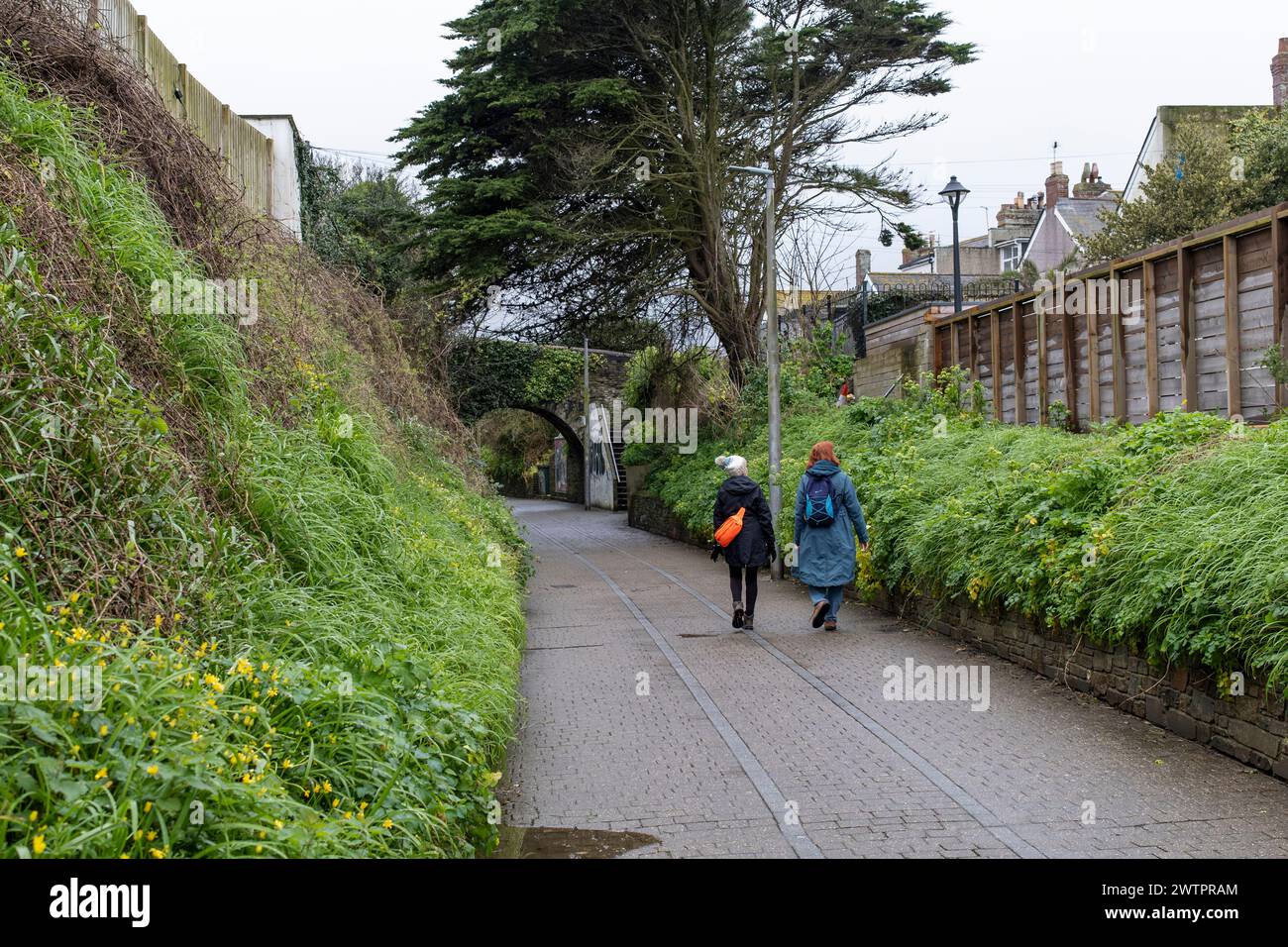 People walking along the pedestrian walking route known as the Tram ...
