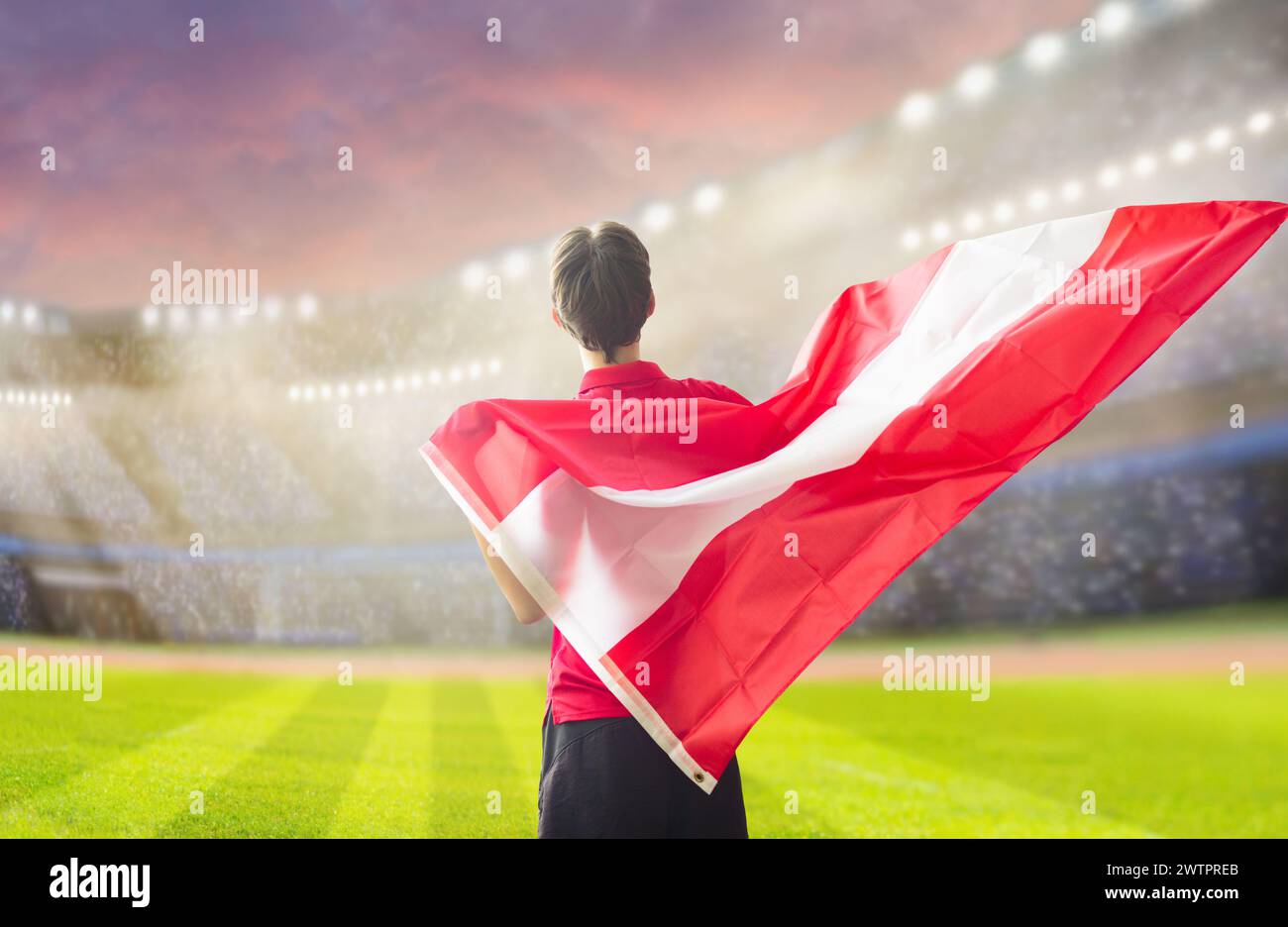 Austria football supporter on stadium. Austrian fans on soccer pitch ...