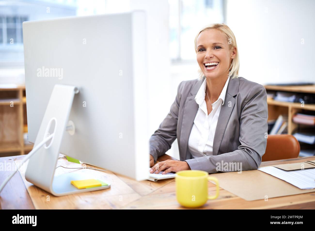 Lawyer, woman and portrait by computer with smile for legal services ...