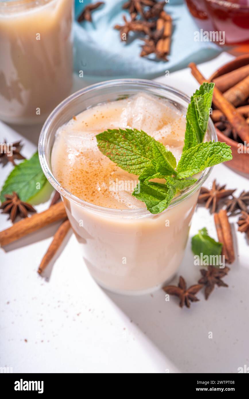 Thai Iced tea, asian indian masala spices drink with non-dairy coconut ...