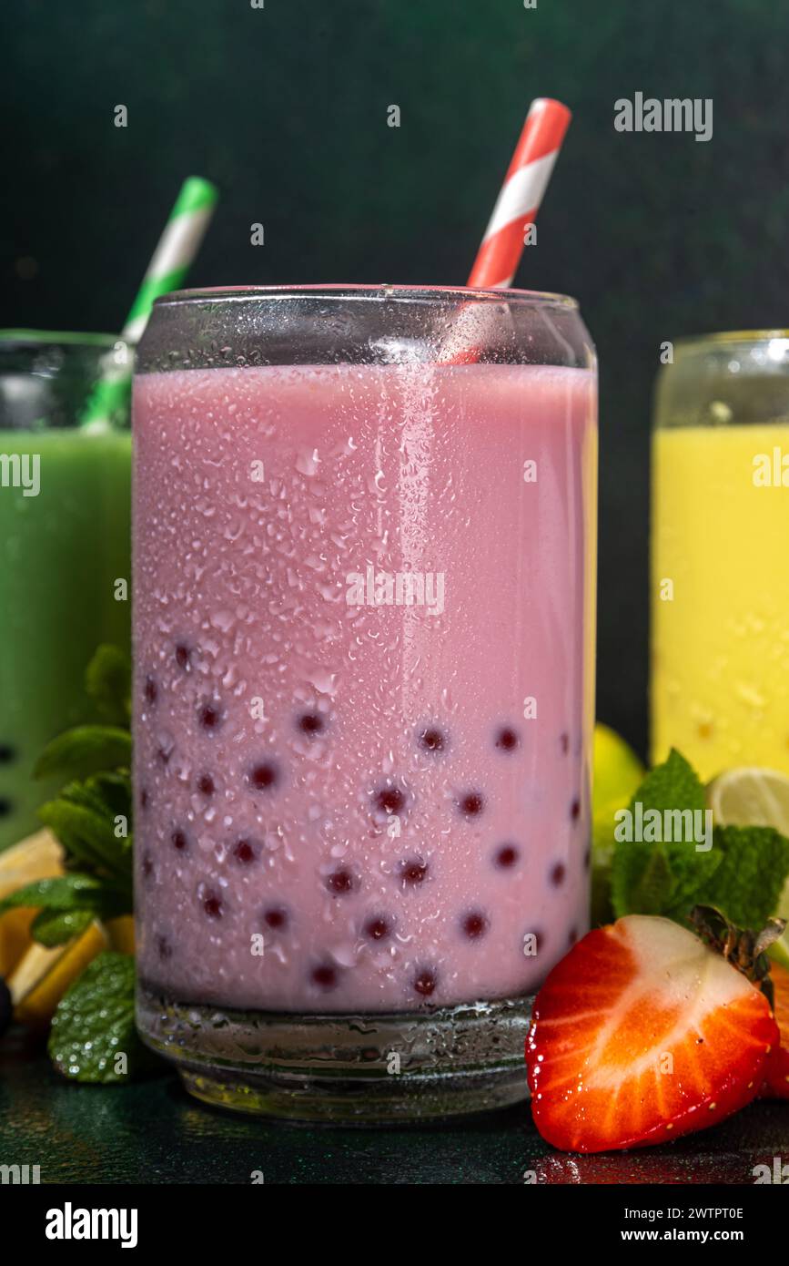 Set of three colorful summer bubble tea, bright creamy pearl tea or ...