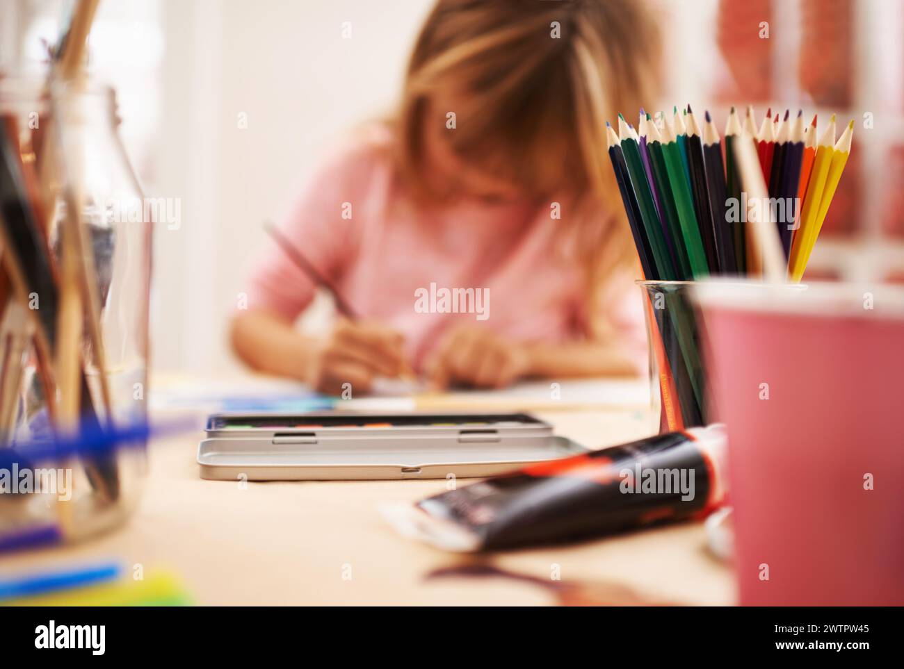 Little girl, drawing and writing with pencil for art, craft or color in ...