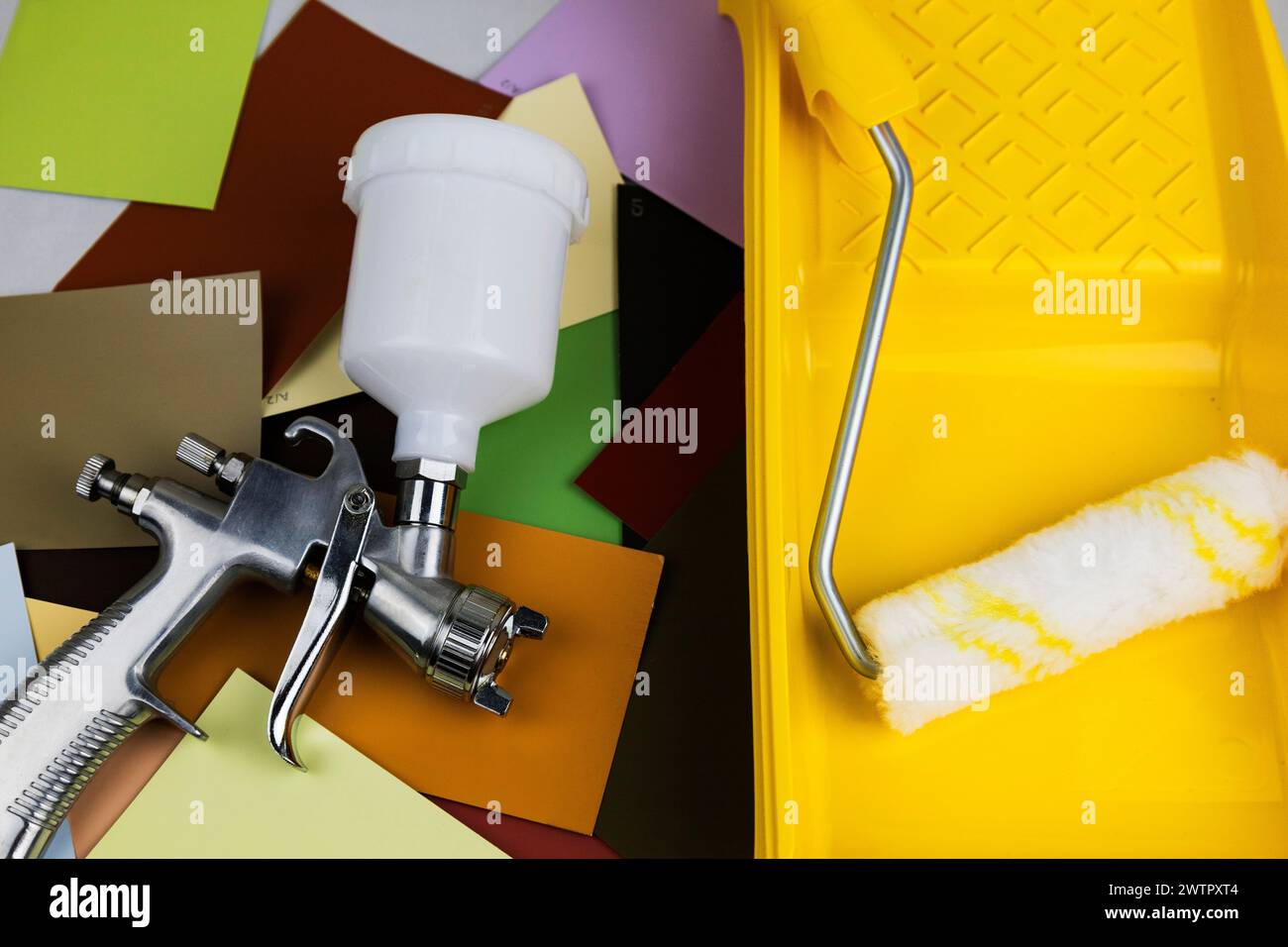 Paint spray gun at work at the workplace in the workshop. Paint Brush ...