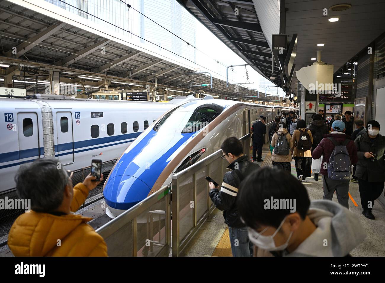 A shinkansen bullet train arrives at Tokyo Station in Tokyo, Japan, on ...