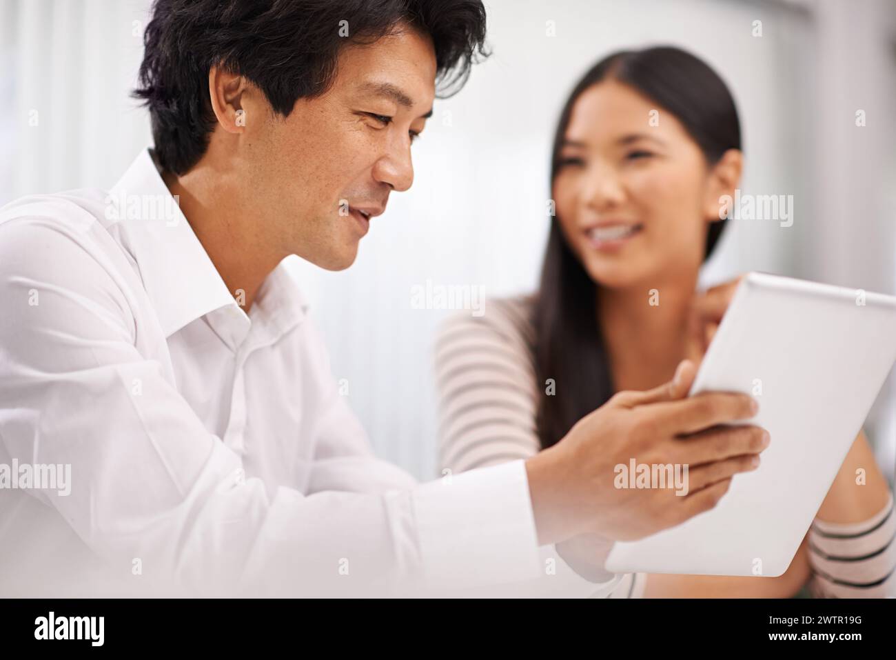 Work, cooperation and people with tablet for collaboration in Japanese ...