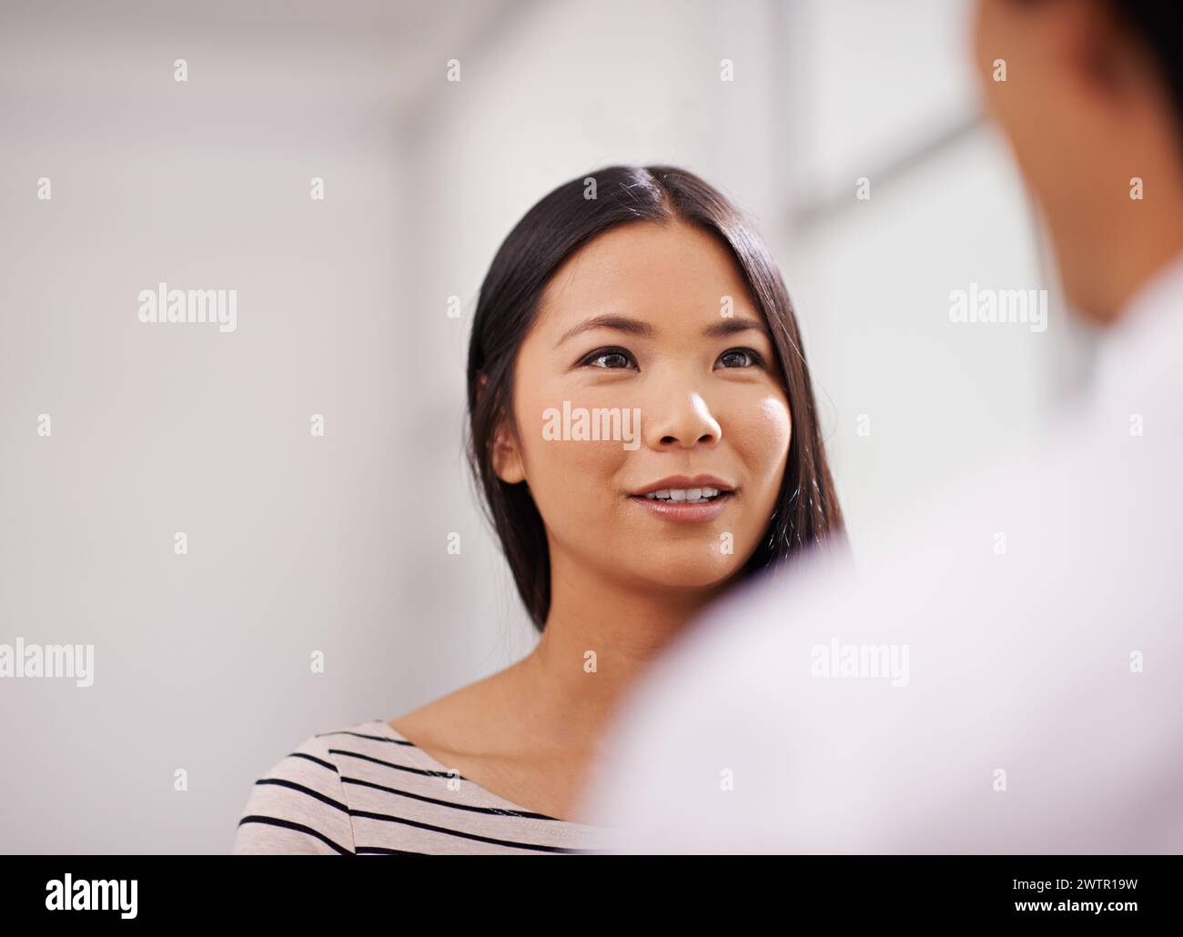 Business, cooperation and asian woman in conversation at office with ...