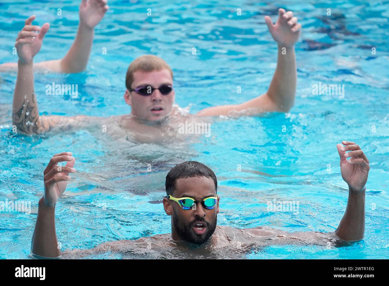 U.S. Olympic Water Polo Team attacker Max Irving, front, trains for the ...