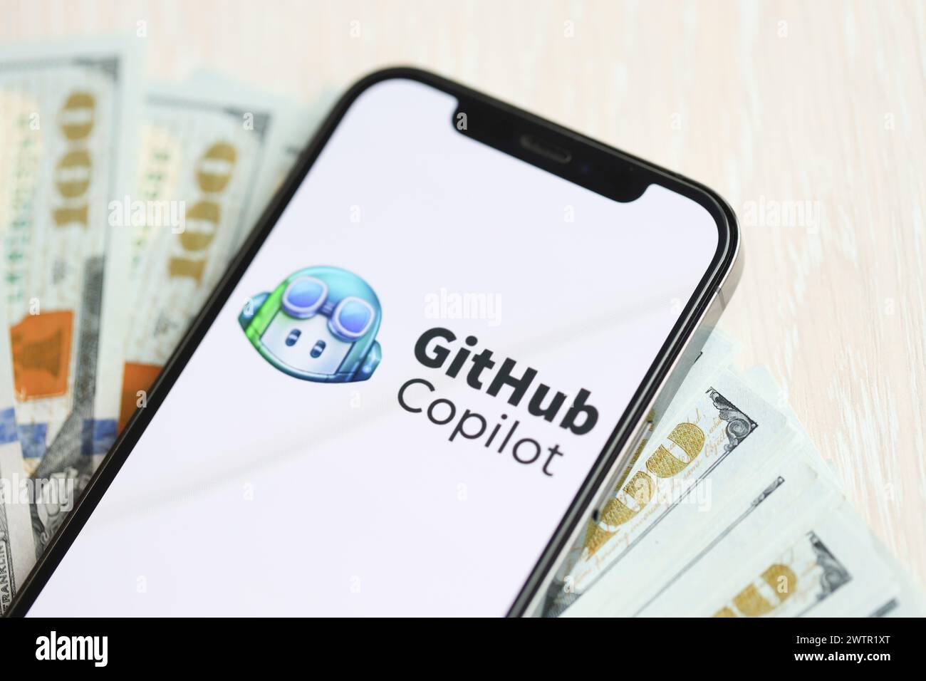 KYIV, UKRAINE - MARCH 17, 2024 Github copilot logo on iPhone display ...