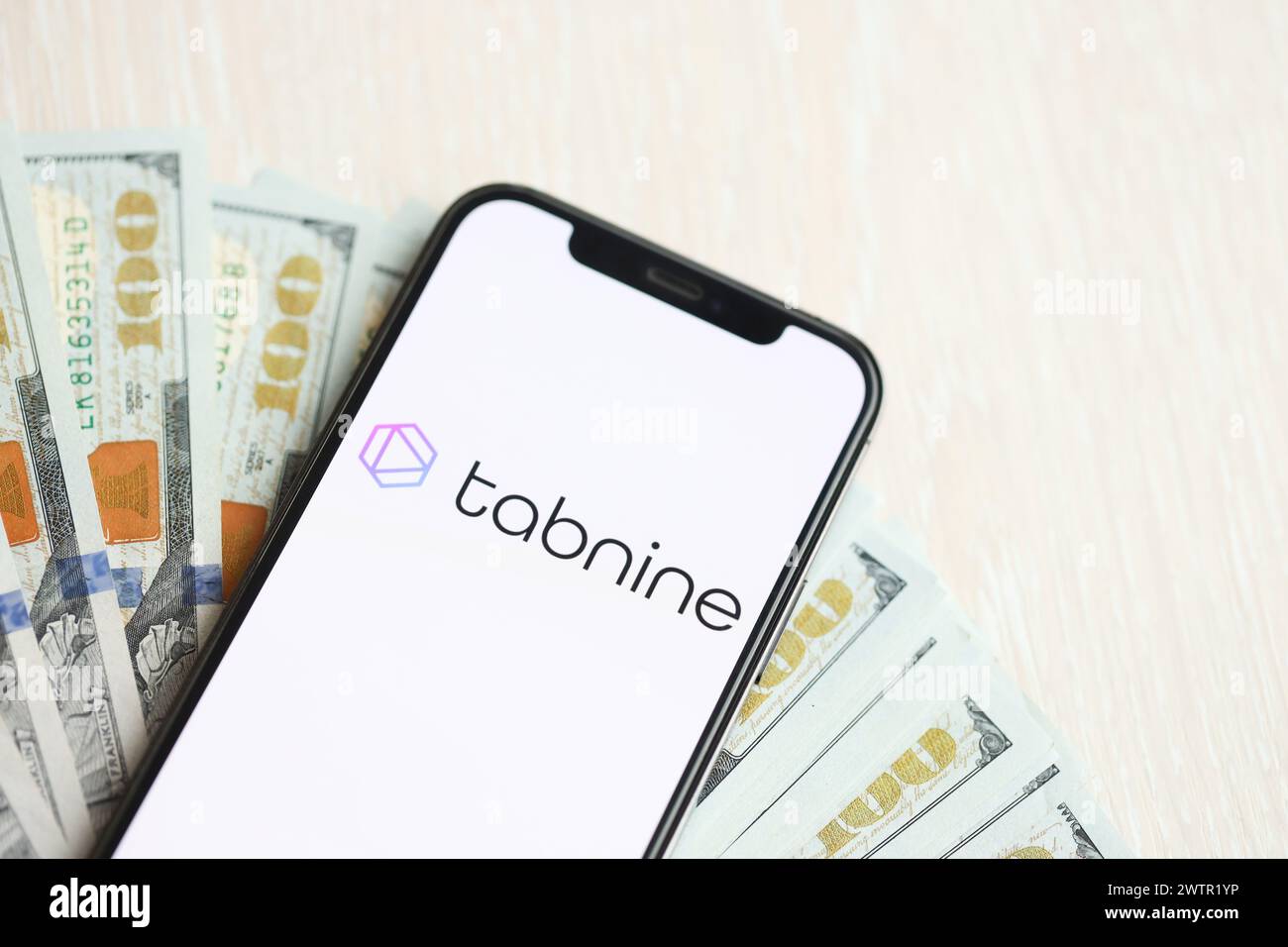 KYIV, UKRAINE - MARCH 17, 2024 Tabnine logo on iPhone display screen ...