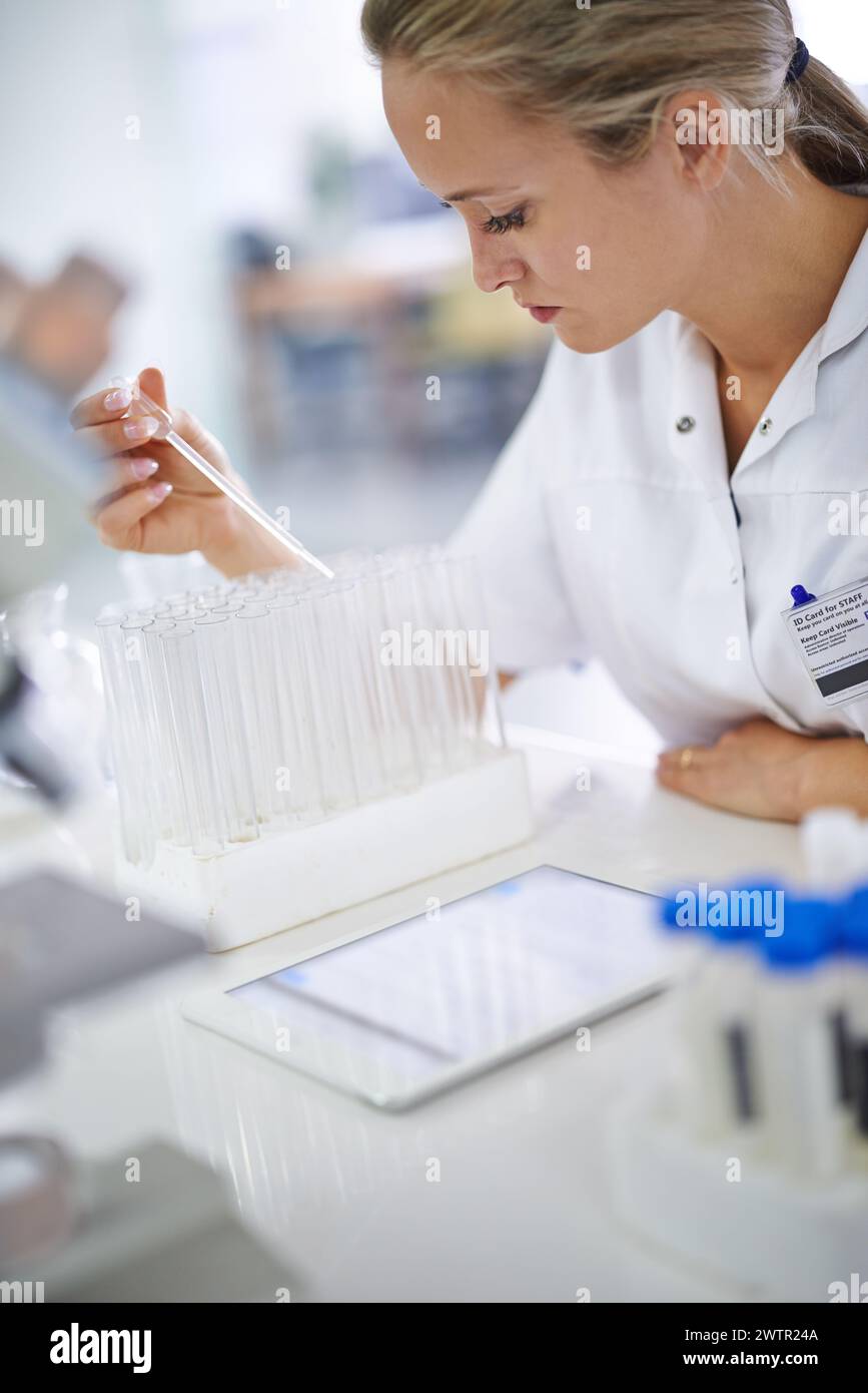 Woman, scientist and vial with test for exam, research or discovery at ...