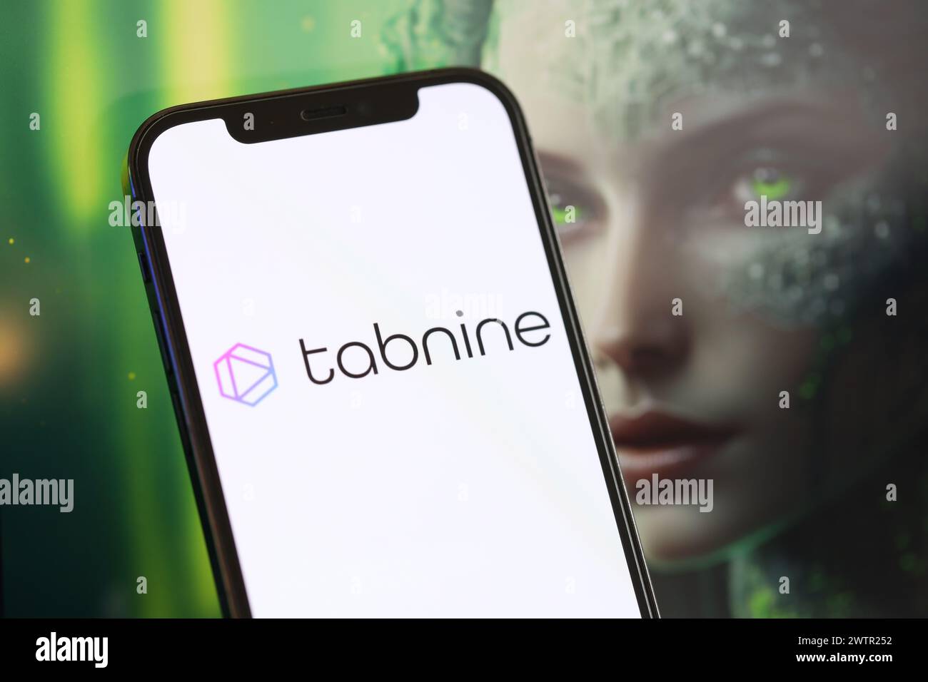 KYIV, UKRAINE - MARCH 17, 2024 Tabnine logo on iPhone display screen ...