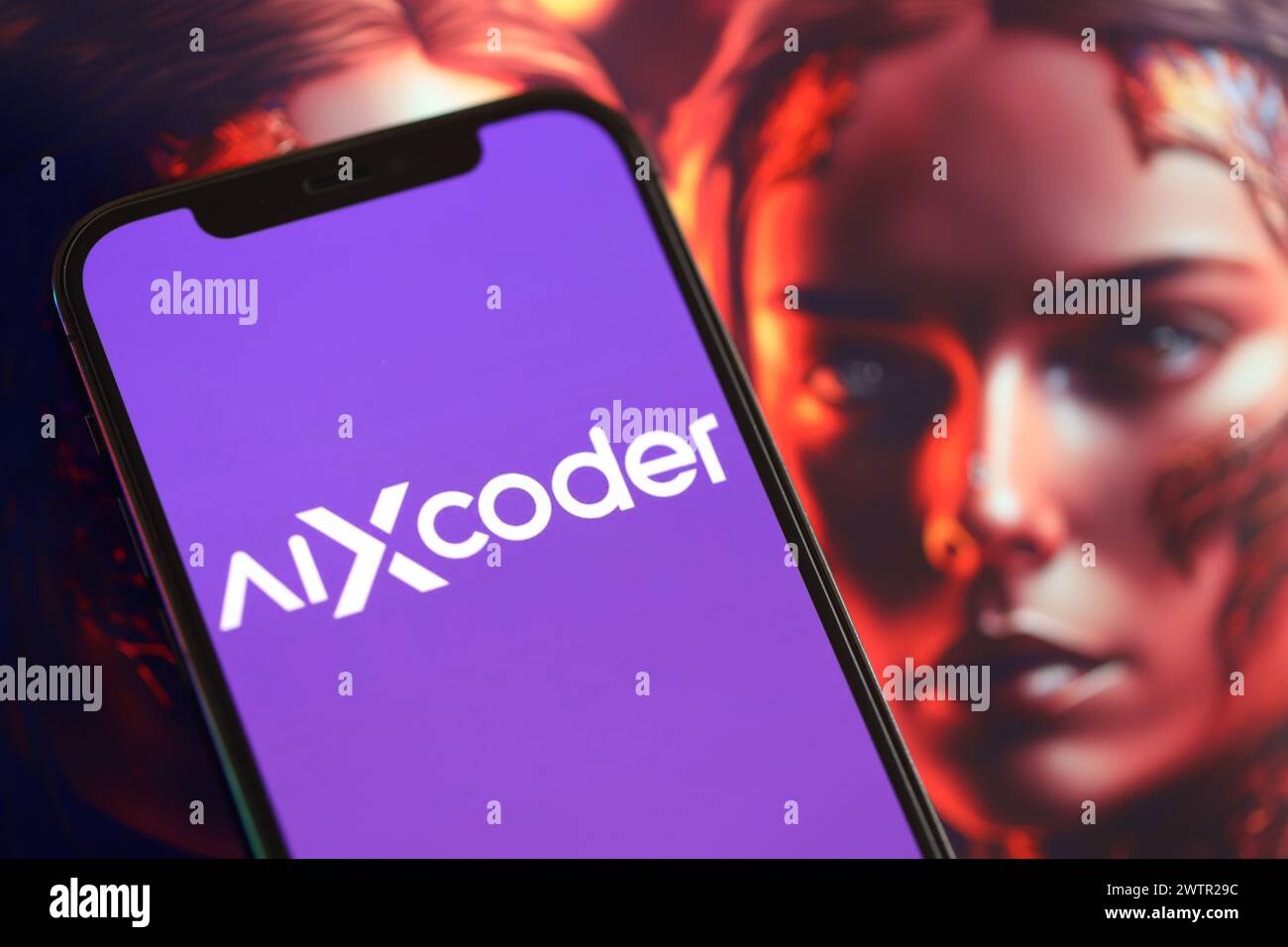 KYIV, UKRAINE - MARCH 17, 2024 AIXcoder logo on iPhone display screen ...