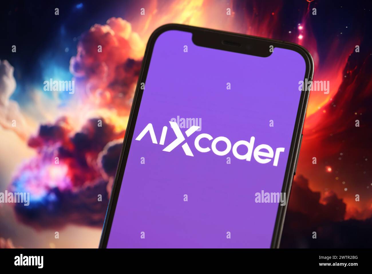 KYIV, UKRAINE - MARCH 17, 2024 AIXcoder logo on iPhone display screen ...