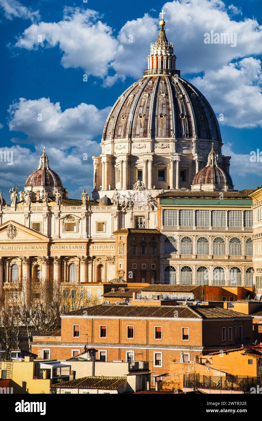 St. Peter's Basilica at daylight with cloudy blue sky. Rome, Vatican ...