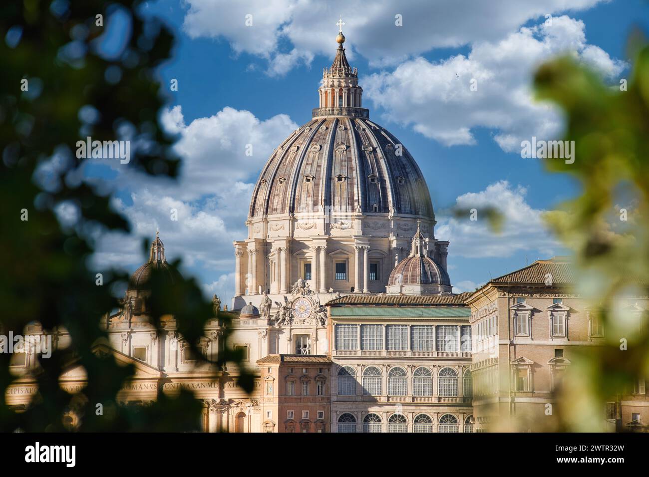 St. Peter's Basilica at daylight with cloudy blue sky. Rome, Vatican ...