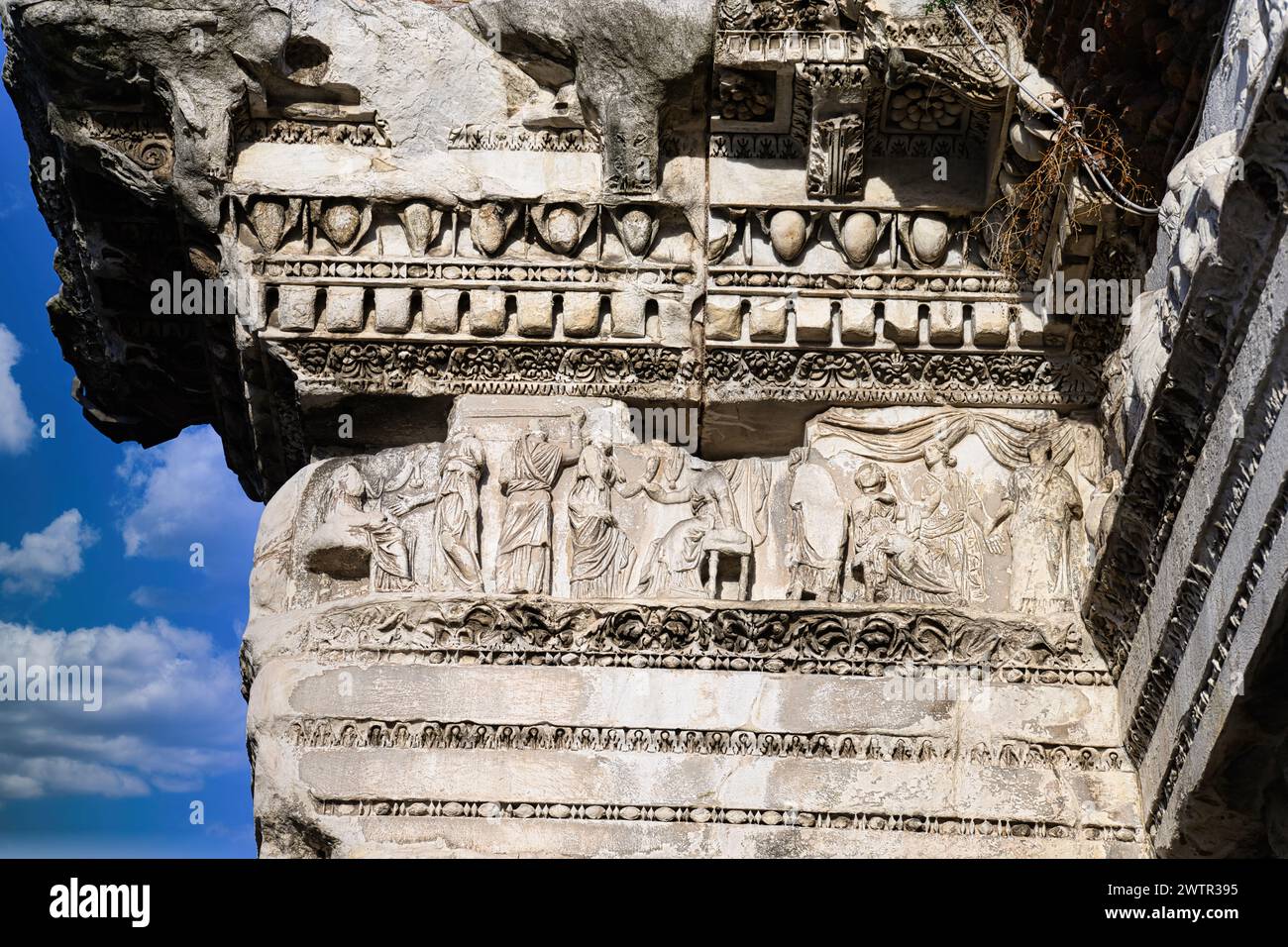 Ancient Roman Marble art on building facade. Blue sky on background ...
