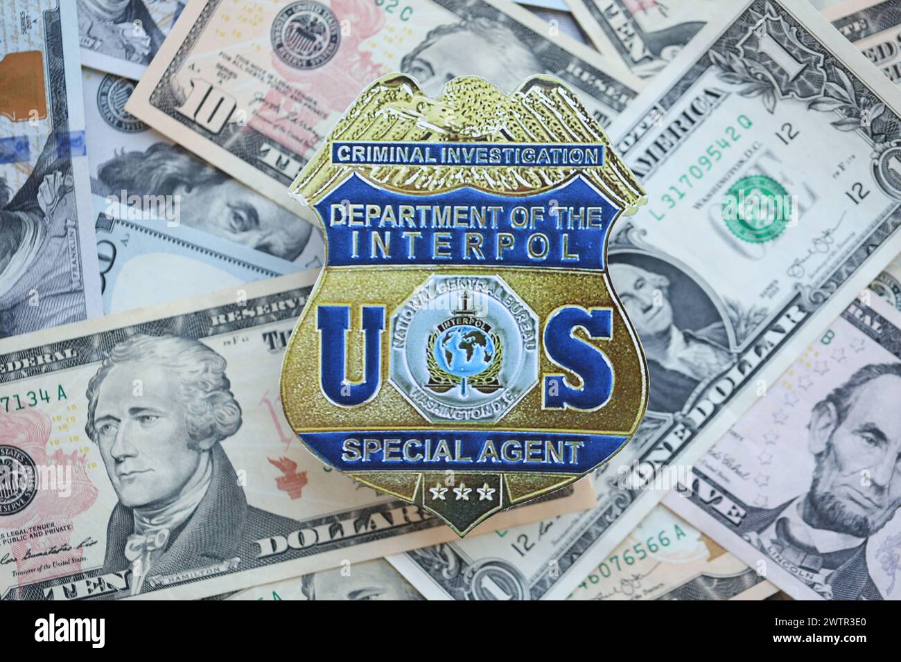 KYIV, UKRAINE - MARCH 9, 2024 US Interpol Special Agent badge on many ...