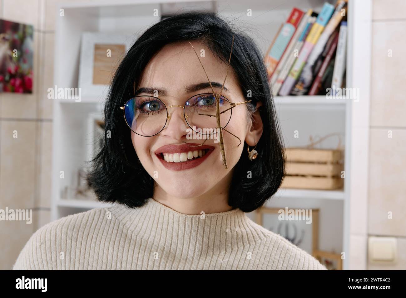 Young Woman Captured in a Beautiful Moment with Her Stick Insect ...