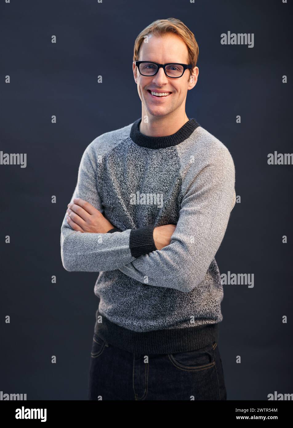 Happy, nerd and portrait of man in studio with arms crossed and pride ...