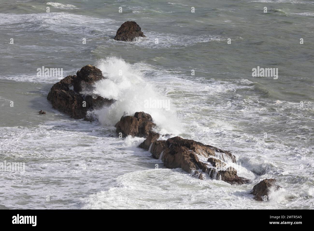 Rocks and sea off the Dorset coast at St Oswald's Bay, in March, Dorset ...