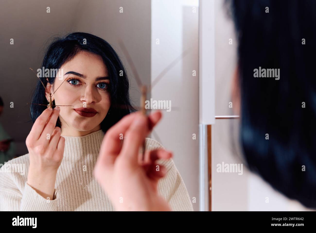 Young Woman Captured in a Beautiful Moment with Her Stick Insect ...