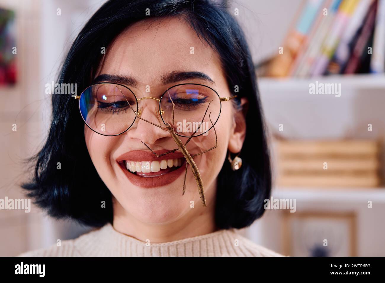 Young Woman Captured in a Beautiful Moment with Her Stick Insect ...