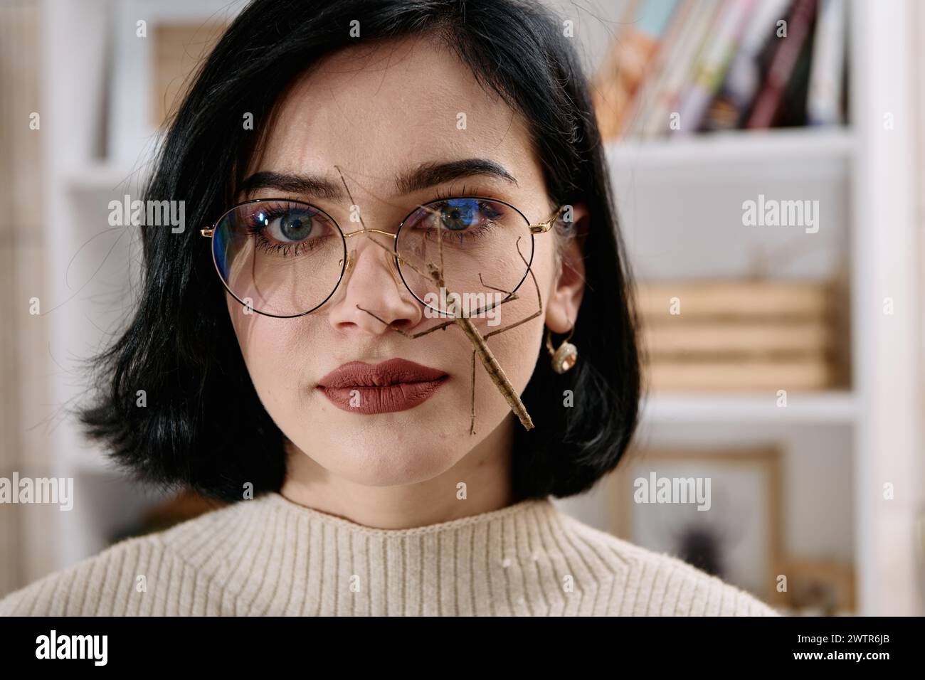 Young Woman Captured in a Beautiful Moment with Her Stick Insect ...