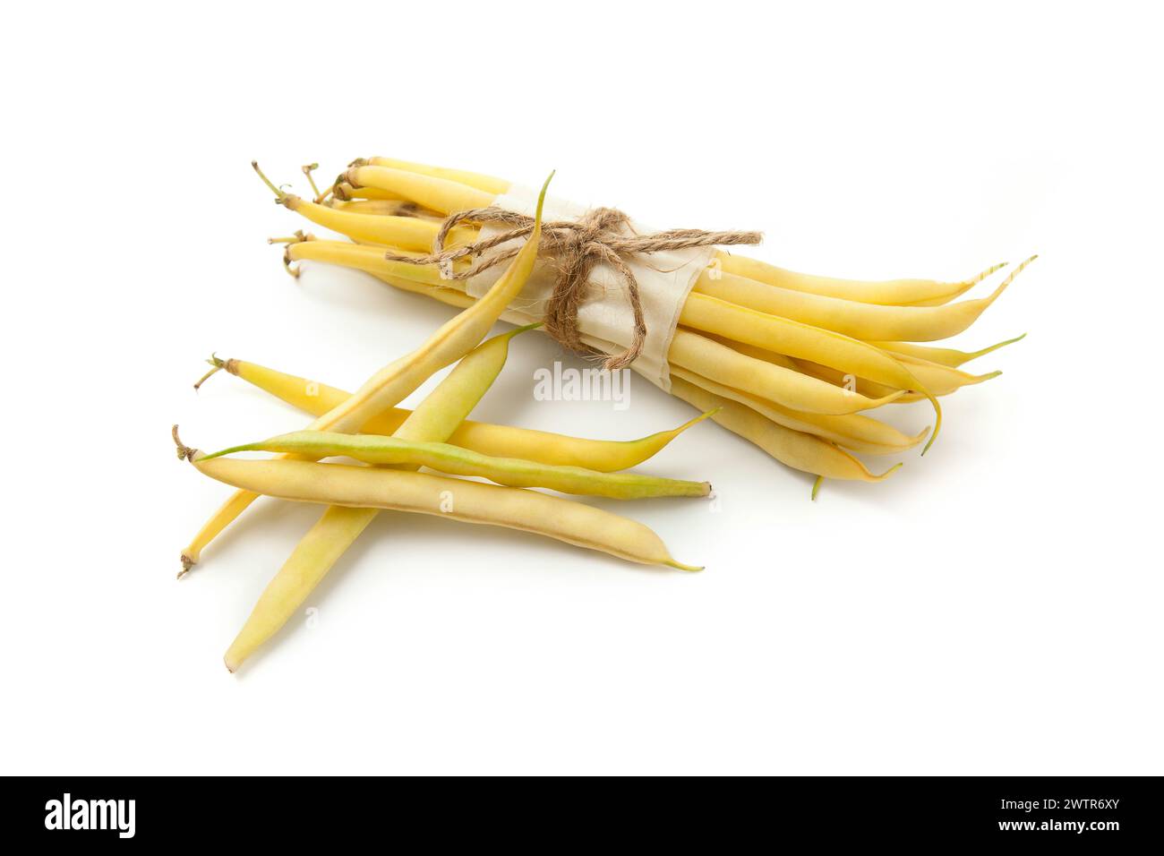 Bunch of raw yellow pods of haricot and several pods isolated on white ...