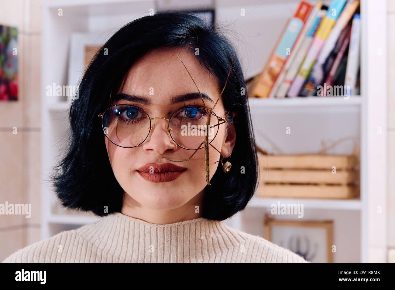 Young Woman Captured in a Beautiful Moment with Her Stick Insect ...