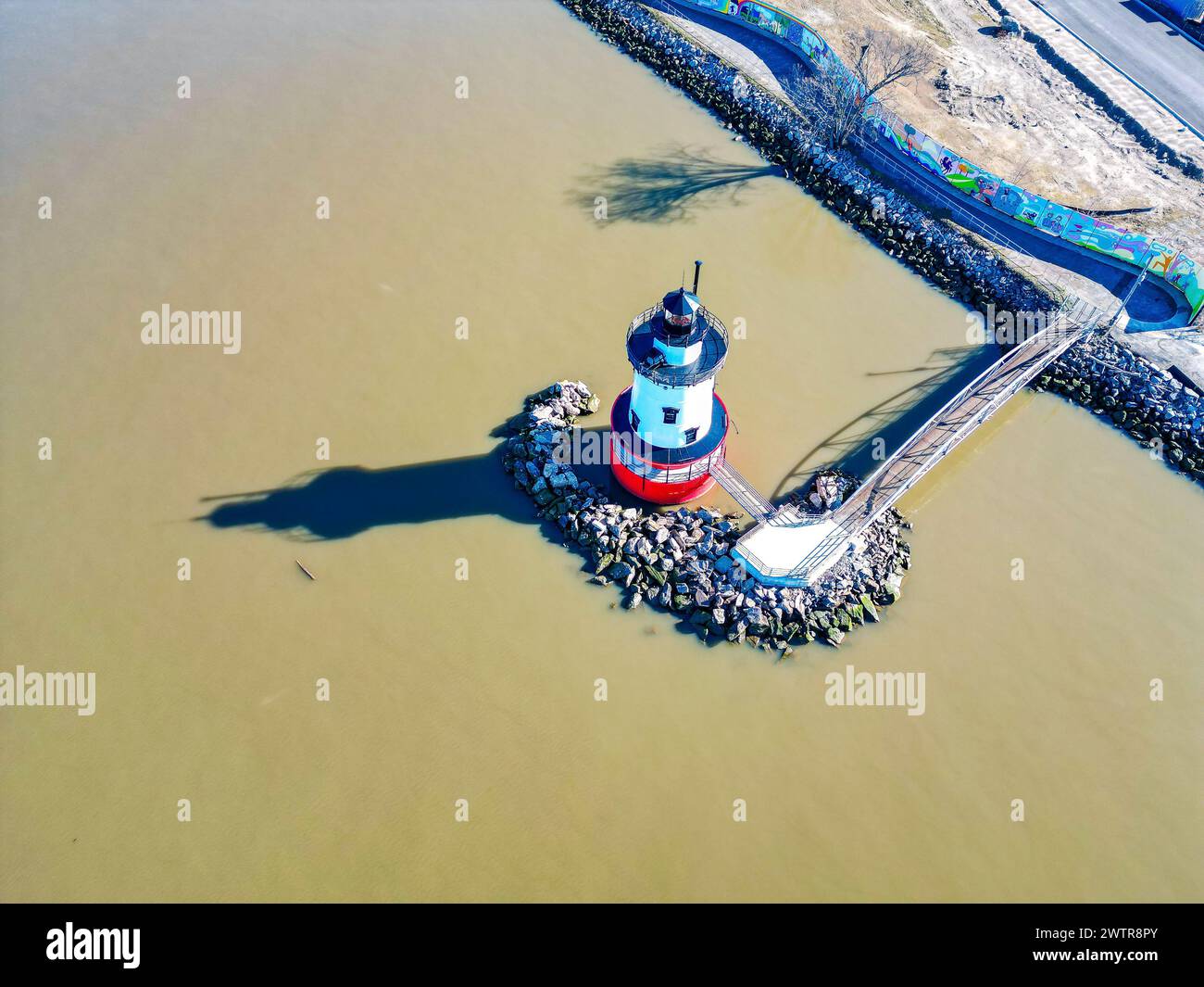 Aerial view of a lighthouse by the water's edge Stock Photo - Alamy