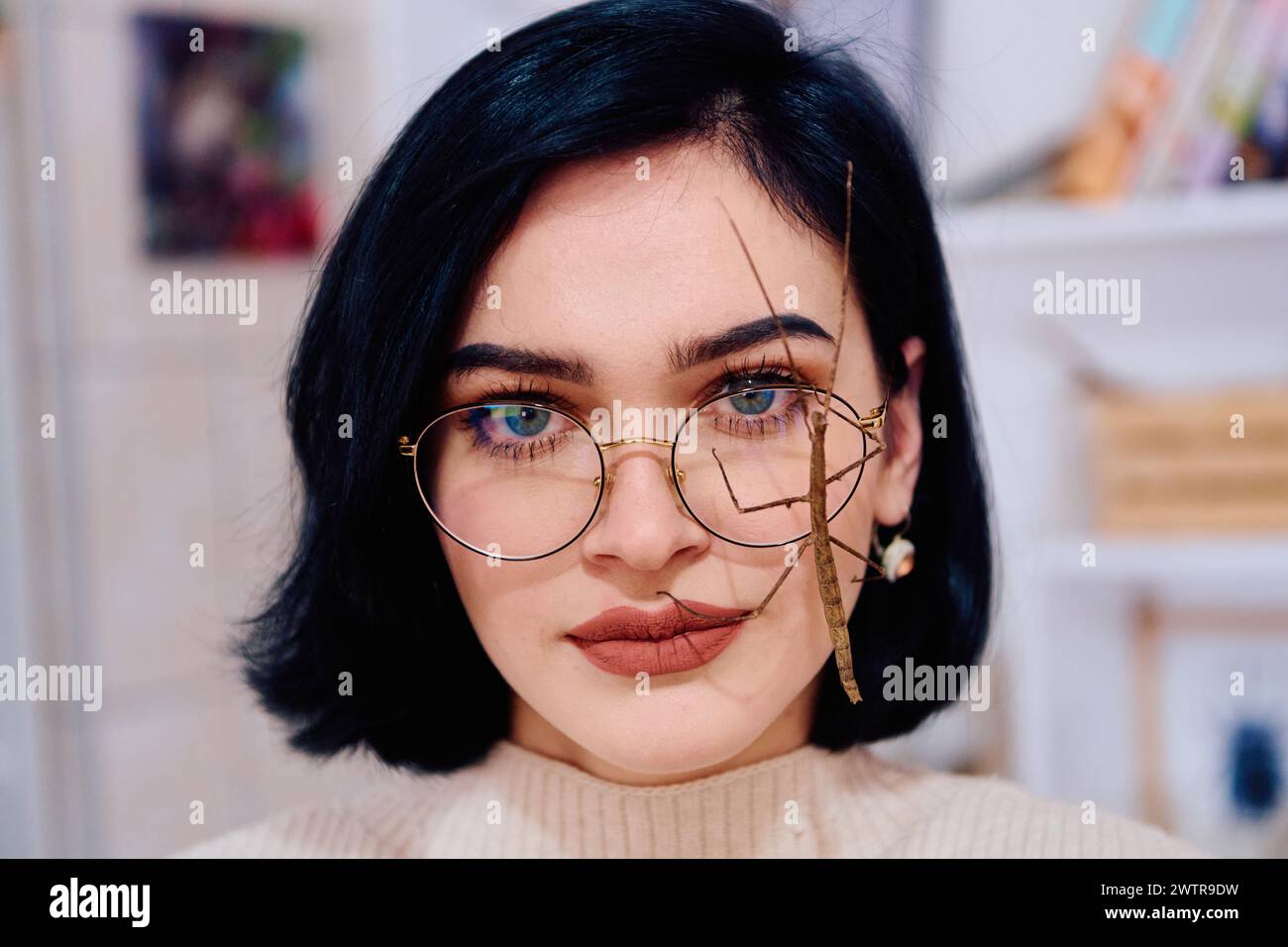Young Woman Captured in a Beautiful Moment with Her Stick Insect ...
