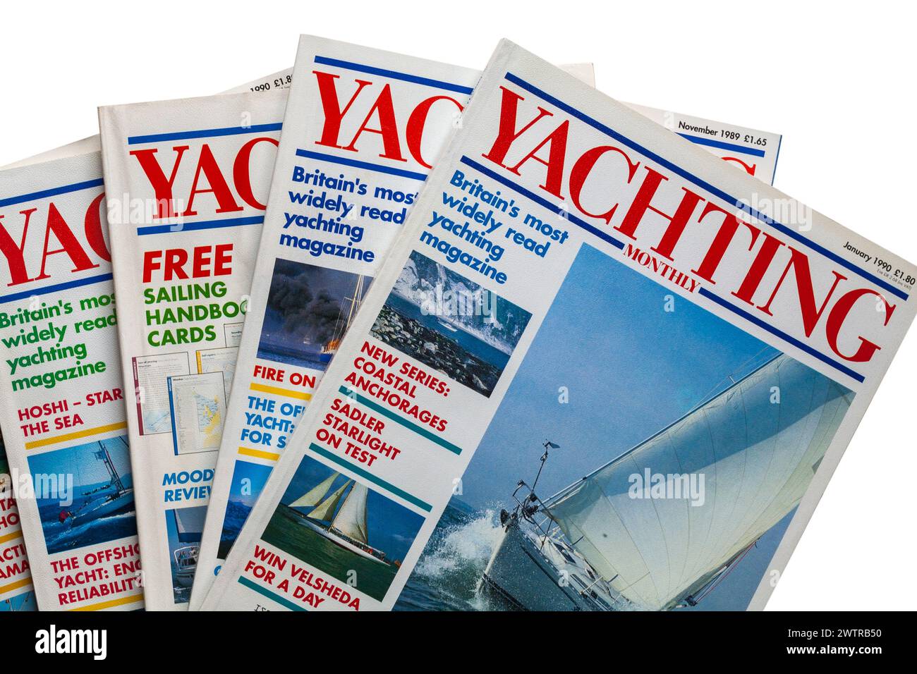 Pile of old Yachting Monthly magazines from 1989-1990 set on white ...