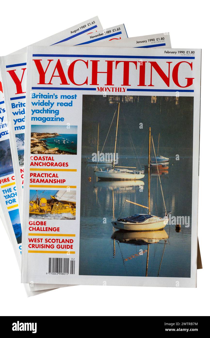 Pile of old Yachting Monthly magazines from 1989-1990 set on white ...