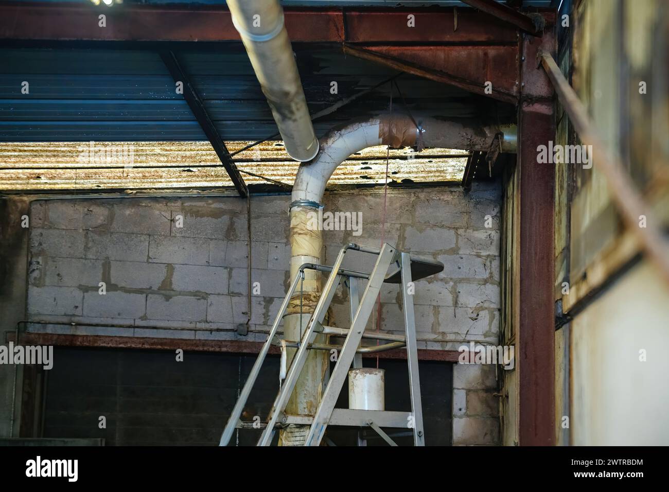 Transforming a neglected factory staircase with worn-out tubes and ...