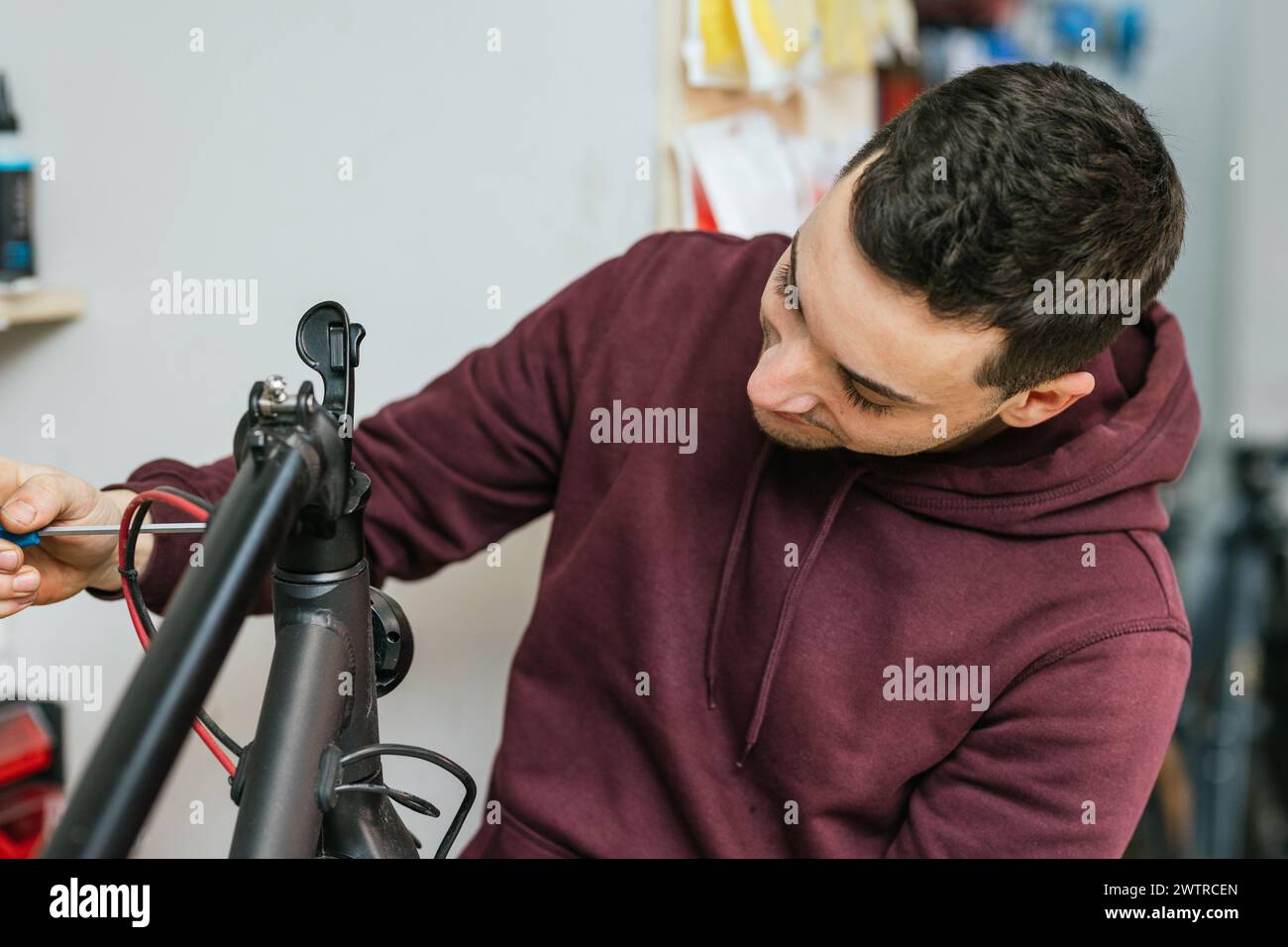 Mechanic repairing scooter hi-res stock photography and images - Alamy
