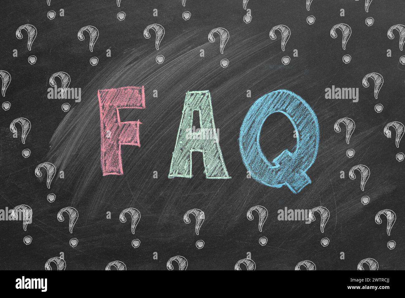Hand drawn text FAQ with question marks on blackboard. Frequently Asked ...