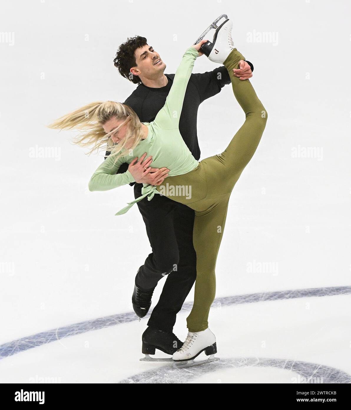 Piper Gilles and Paul Poirier, from Canada, perform their ice dance ...