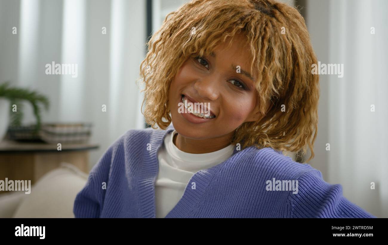 Portrait at home couch cheerful laughing joyful student girl ethnic ...