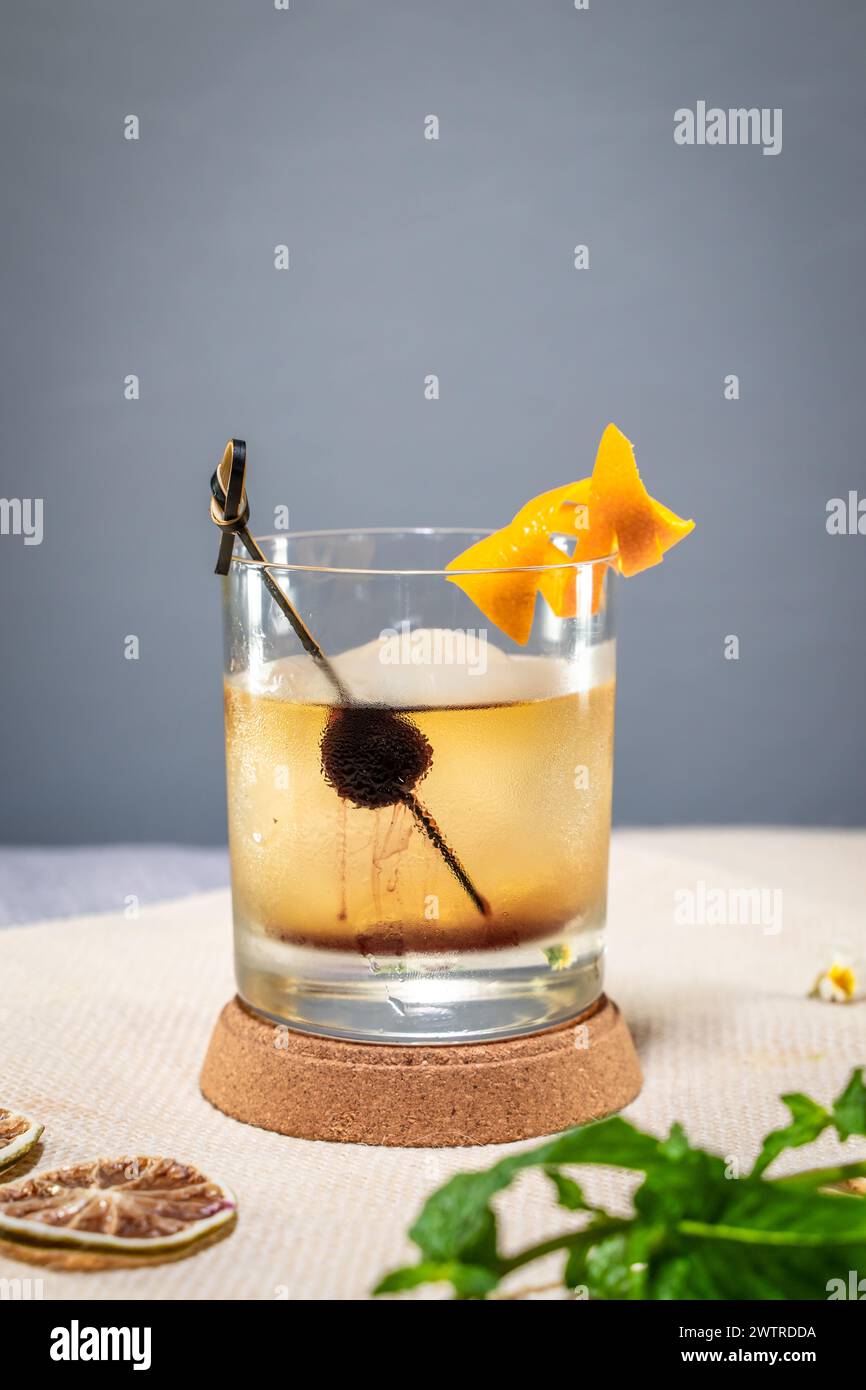 Classic cocktail with orange peel garnish Stock Photo - Alamy