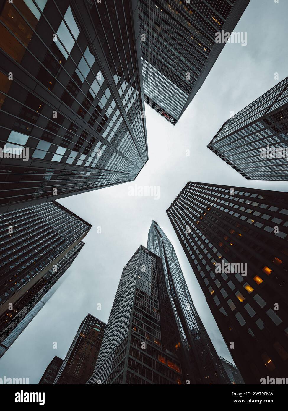 Urban skyline with tall city buildings viewed from below Stock Photo ...