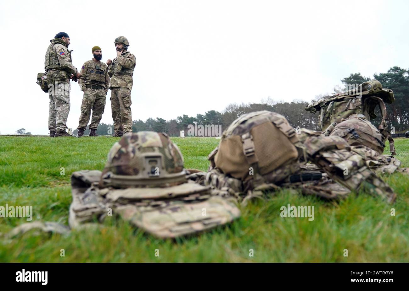 (from left to right) Corporal A Singh, Guardsman K Singh and Corporal ...