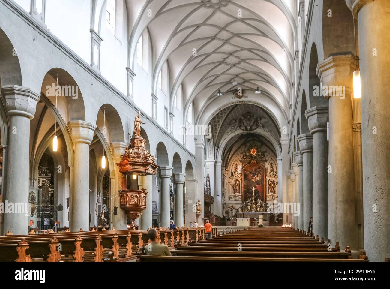 Lovely view of the Romanesque nave, vaulted in baroque style with ...
