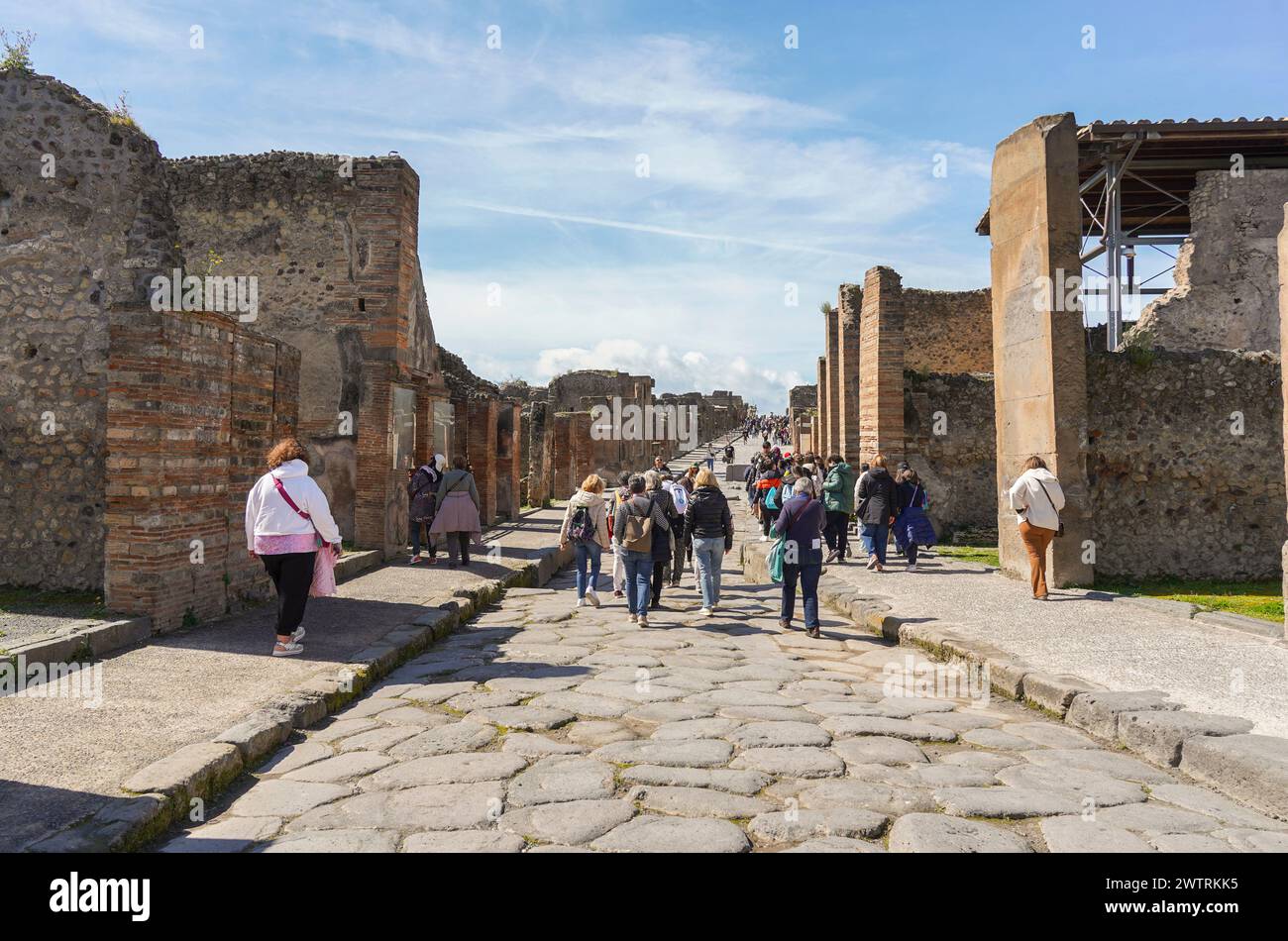 Pompeii Italy, Street in ancient Pompeii, paved during Roman times with ...