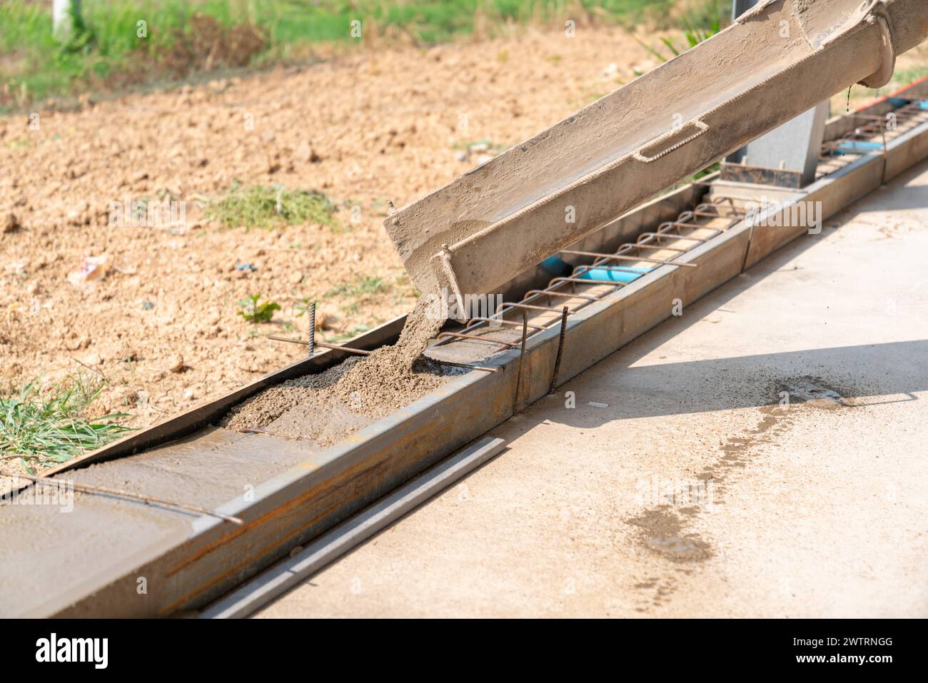 Truck pouring concrete timber formwork with metal reinforcement for ...