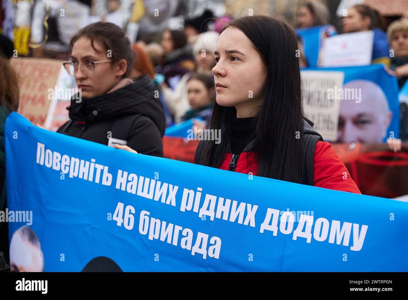 Sad Ukrainian girl holds a banner "Bring Our Relatives Home. 46th ...